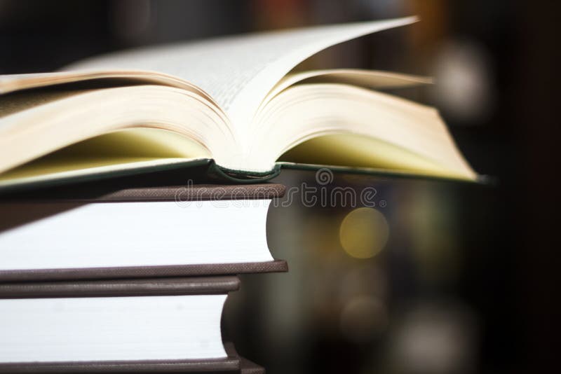 An Open Book on a Book Stack Stock Photo - Image of intellect, lesson ...