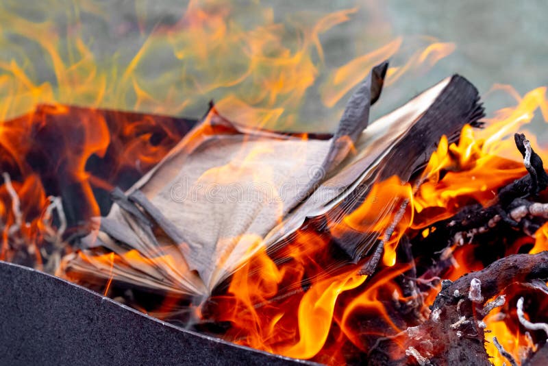 An Open Book is Burning on the Hearth Stock Image - Image of book ...
