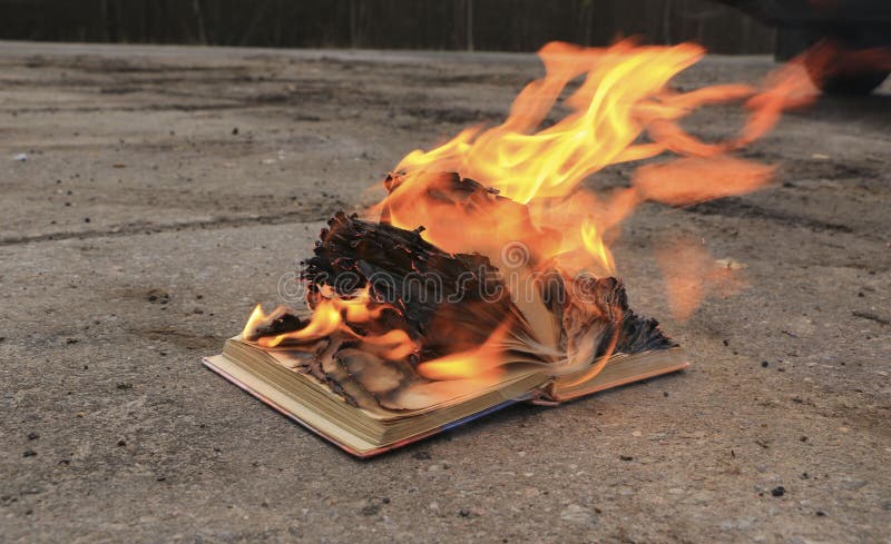 Book with Burning Pages on a Concrete Surface Stock Image - Image of ...