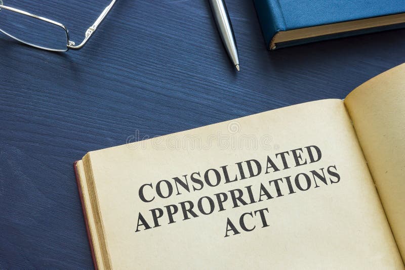 Open Book with Consolidated Appropriations Act and Pen. Stock Image ...