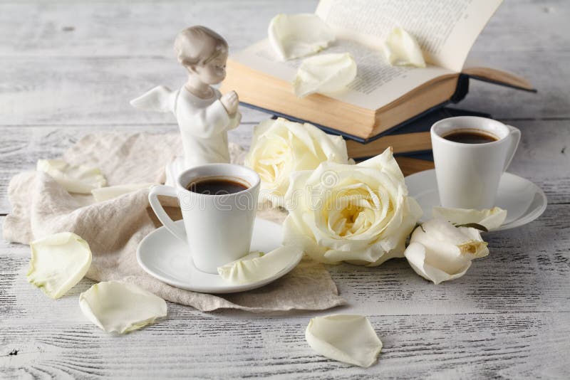 Open Book and Cup of Tea on Wooden Table Stock Photo - Image of petal ...