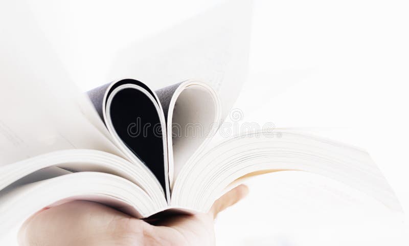 Open Book with Curled Leaves in the Shape of a Heart Stock Image ...
