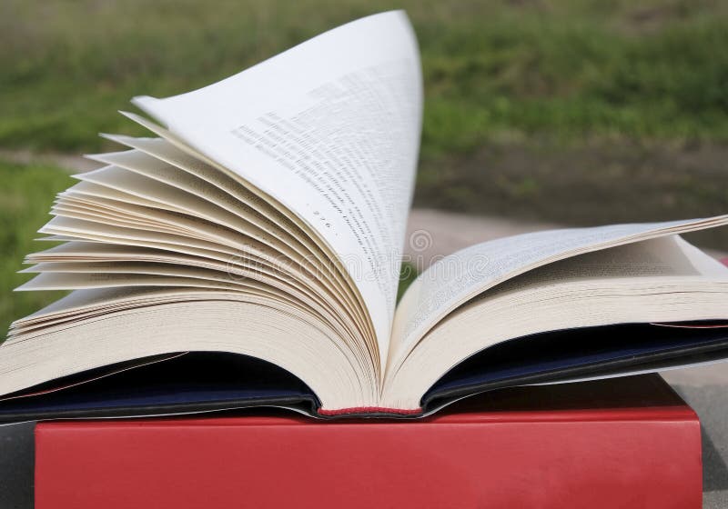 Open Book with Flying Pages Stock Photo - Image of outdoor, media ...