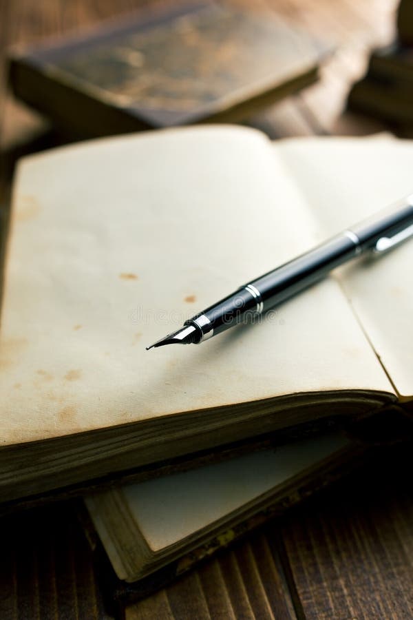 Open Book with Fountain Pen Stock Image - Image of antique, table: 35690149