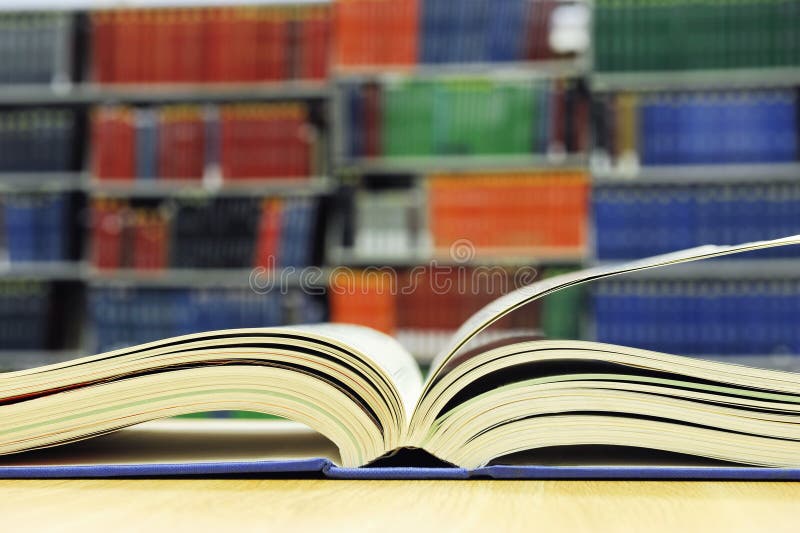 Open Book in Front of Bookshelf Stock Photo - Image of learning ...