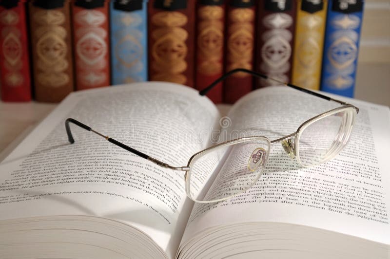 Open book with glasses stock image. Image of document - 17121673