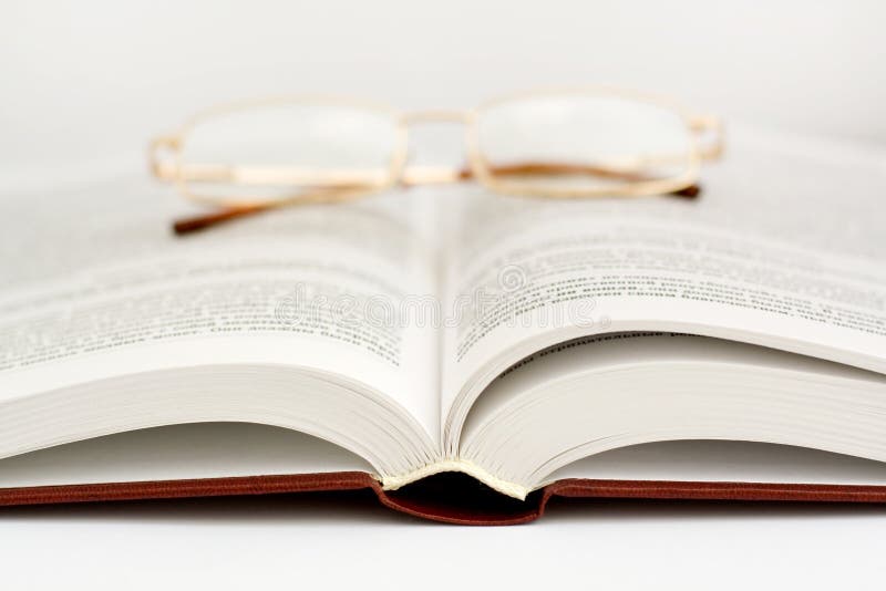 Open book with glasses stock image. Image of readings - 5189553