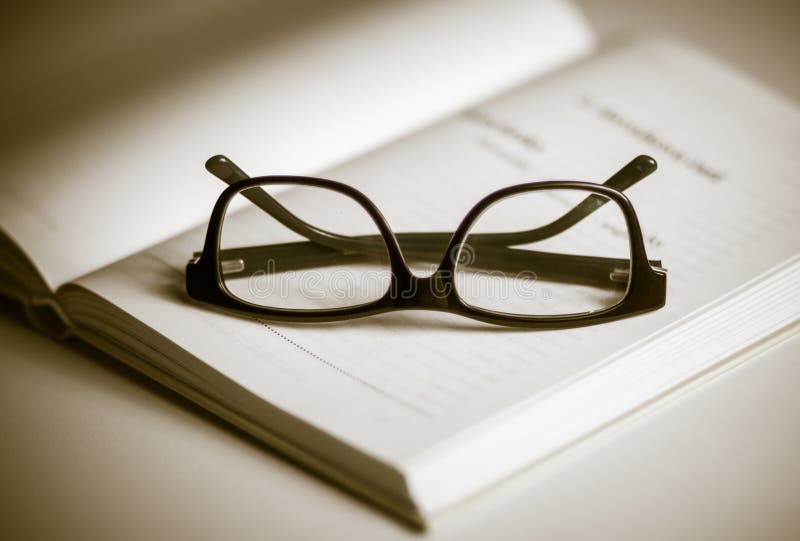 Open book and glasses stock photo. Image of glasses, book - 47232072