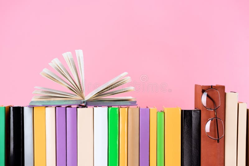 Open Book and Glasses on Row of Books Stock Image - Image of space ...
