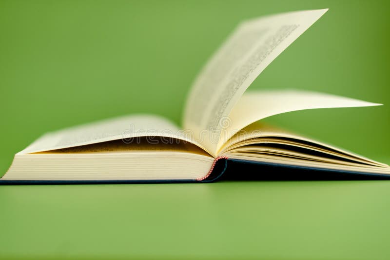 Open Book on Green Background Reading Concept Stock Image - Image of ...