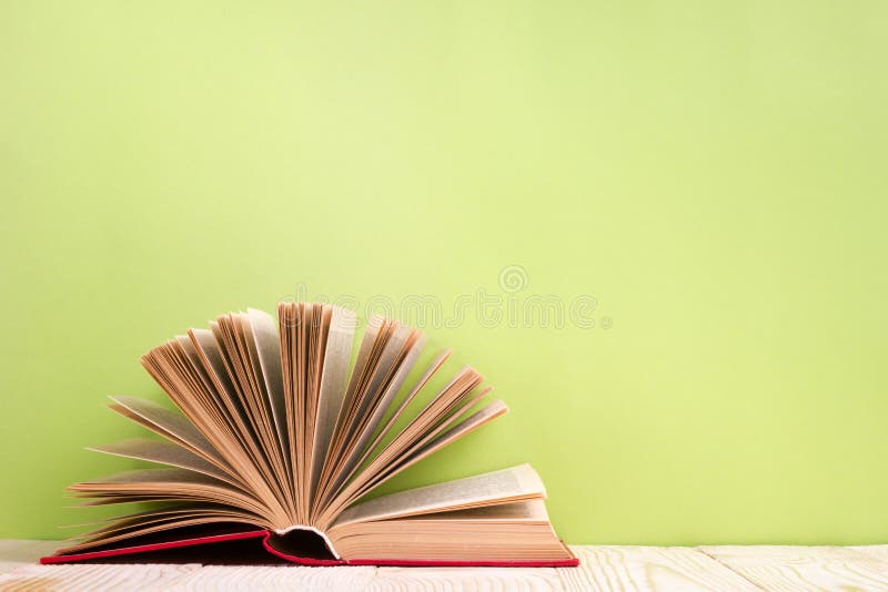 Open Book on Green Wooden Background. Education Background. Stock Photo ...