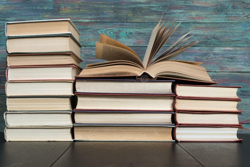 Open Book Hardback on Stack Books Stock Image - Image of leisure ...