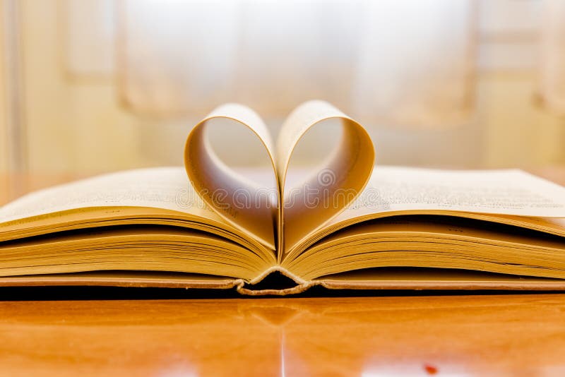 Open book with heart 1 stock image. Image of folded - 114417587