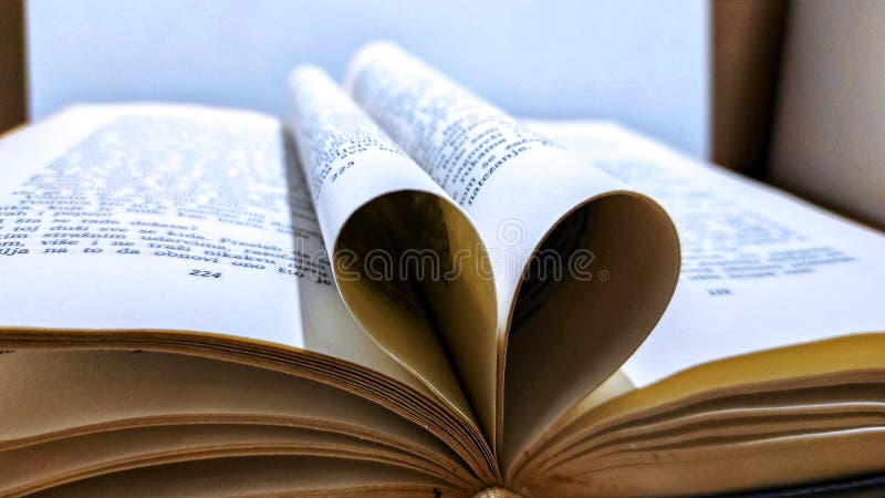 An Open Book and Heart-shaped Sheets, an Idea for an Advertisement ...