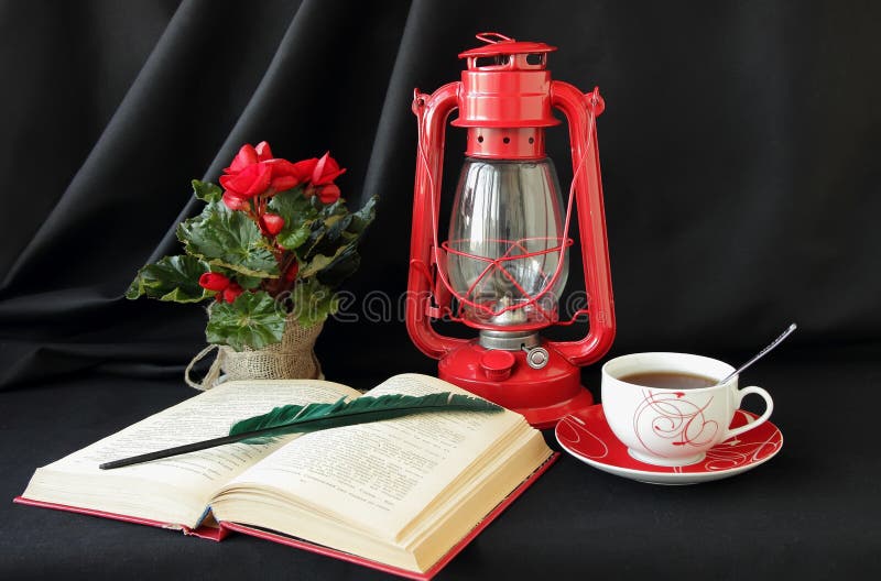 Open Book, Lamp and a Cup of Tea Stock Photo - Image of drink, black ...