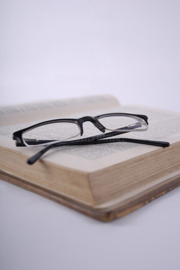 Open Book and Lenses stock photo. Image of letters, book - 10274136