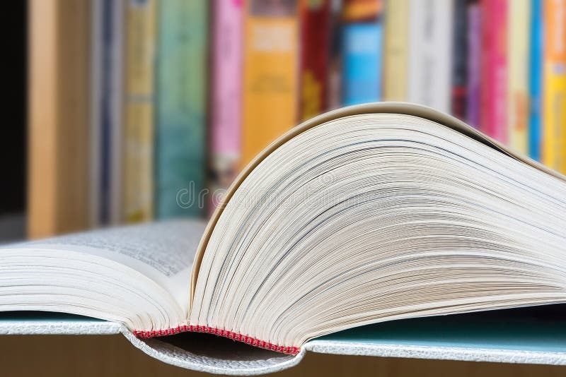 Open Book with a Library in Background Stock Photo - Image of page ...