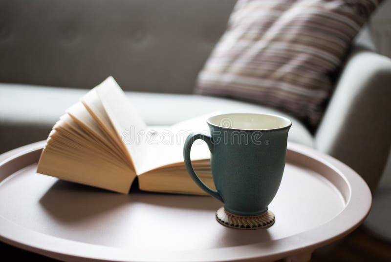 Open Book on a Living Room Table Stock Photo - Image of floor, home ...