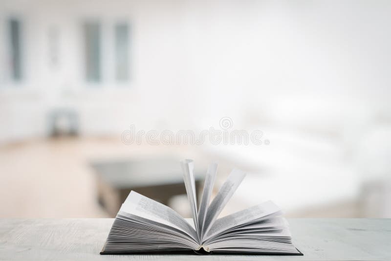 Open Book in the Living Room Stock Photo - Image of blur, interior ...
