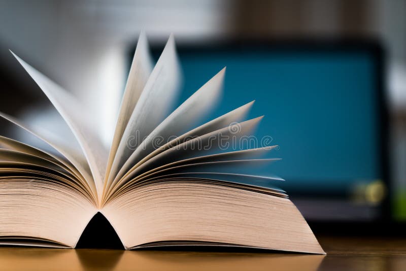 Open Book Lying on the Table in the Library Stock Image - Image of ...