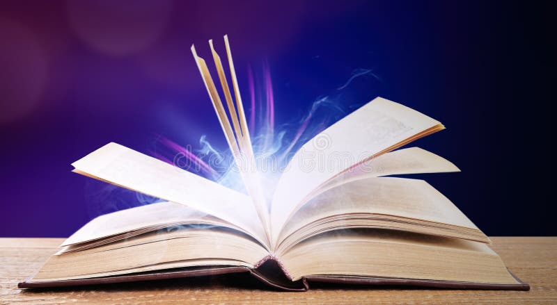 Open Book with Magic Glowing on Table. Fairy Tale Stock Image - Image ...