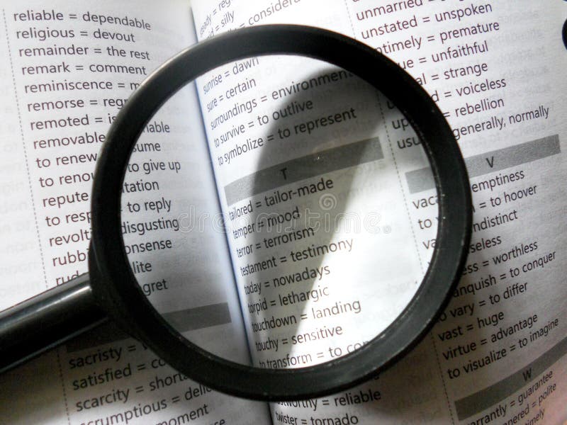 Magnifying Glass Resting Dictionary Pages Stock Photos - Free & Royalty ...