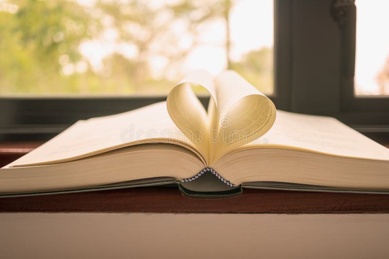 Open Book with Pages Shaped Like Heart Stock Photo - Image of love ...