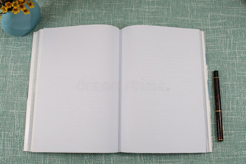 Open Book and Pen on the Blue Cloth Stock Image - Image of notebook ...