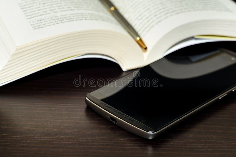Open Book, Pen and Cell Phone on Wooden Table Stock Image - Image of ...