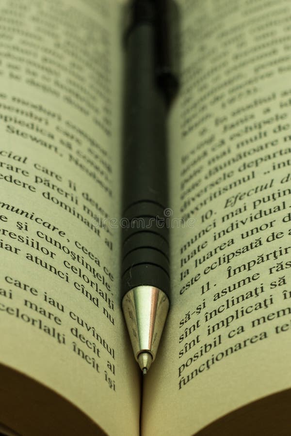 Open Book with a Pen in the Middle Editorial Stock Photo - Image of ...