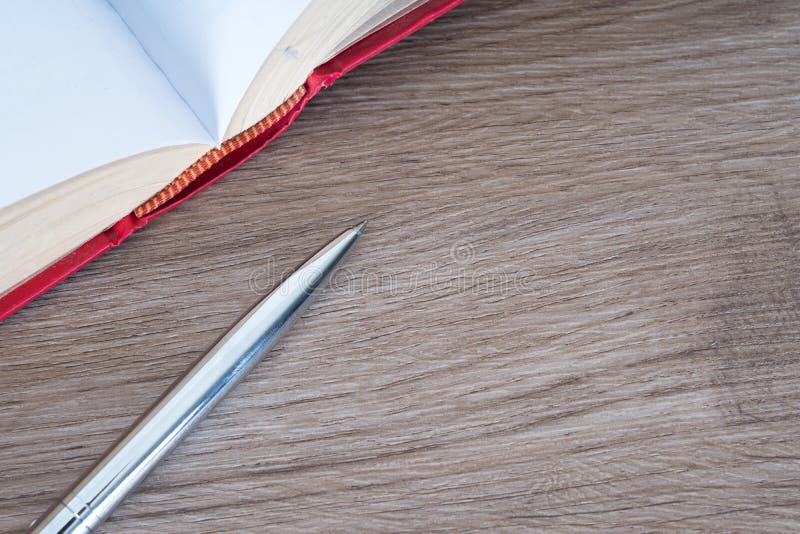 An Open Book and a Pen on the Table Stock Photo - Image of open ...