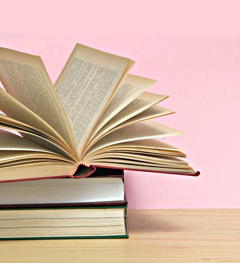 Open Book And Pile Of Books Picture. Image: 10200070