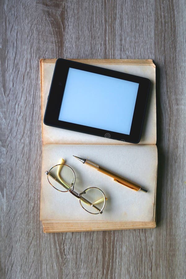Open Book, Reading Glasses, Mechanical Pencil and E-Reader Stock Image ...