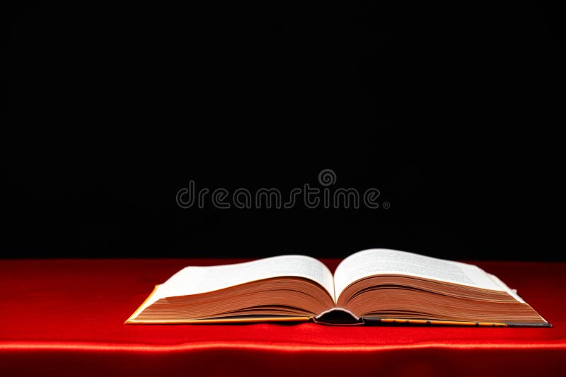 Open Book on Red and Black Background. the Wisdom of Generations ...