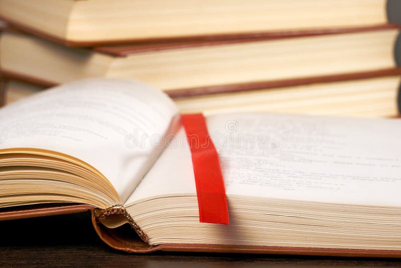 Open Book with Red Bookmark Stock Photo - Image of literary, band ...
