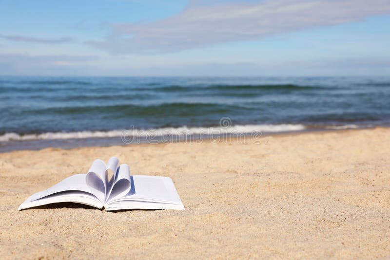 Open Book on Sandy Beach Near Sea. Space for Text Stock Image - Image ...