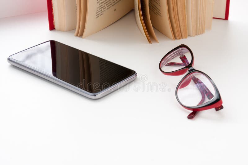 Open Book, Smartphone and Red Glasses on the Table Stock Image - Image ...