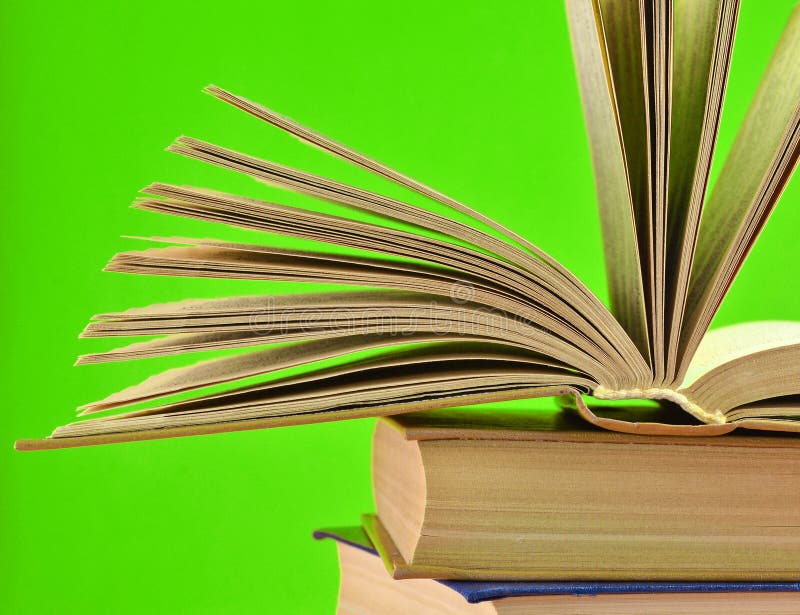 Open Book, a Stack of Books Isolated on a Blue Background. Copy Stock ...