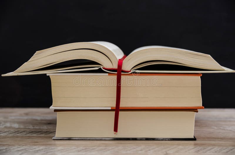 Open Book on a Stack of Books. Education Concept. Stock Image - Image ...