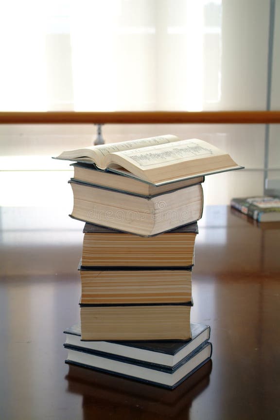Open Book on a Stack of Books Stock Image - Image of studying, books ...