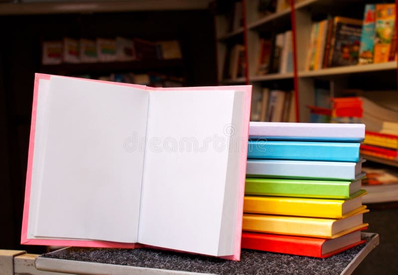 Open Book with a Stack of Colorful Books Stock Image - Image of book ...