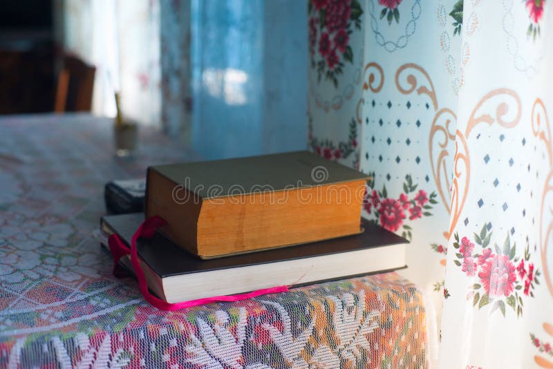 Open Book, Stack of Hardback Books on Table. Top View. Stock Photo ...