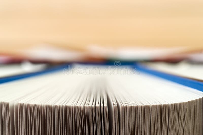 Open Book, Stack of Hardback Books on Wooden Table. Stock Image - Image ...