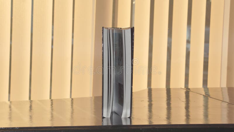 The Open Book Stands Upright Stock Photo - Image of light, cleaved ...