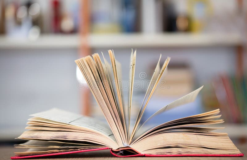 An open book on table stock photo. Image of yellowing - 196827210