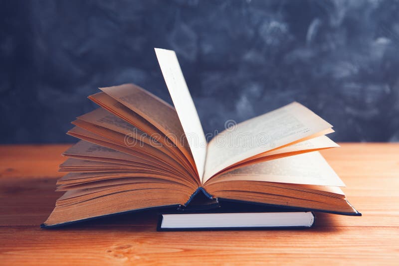 Open book on the table stock image. Image of education - 237730599