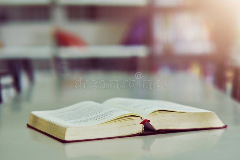 Open book on the table stock photo. Image of concept - 228798406
