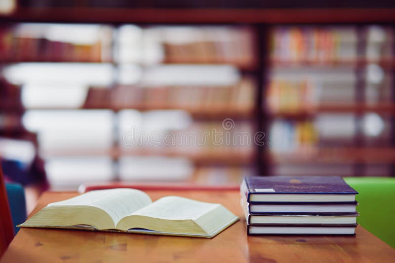 Open book on the table stock image. Image of library - 235544861