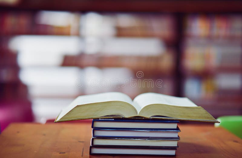 Open book on the table stock photo. Image of design - 235544912