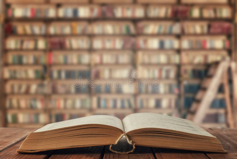 Open Book on the Table in the Library Stock Photo - Image of interior ...